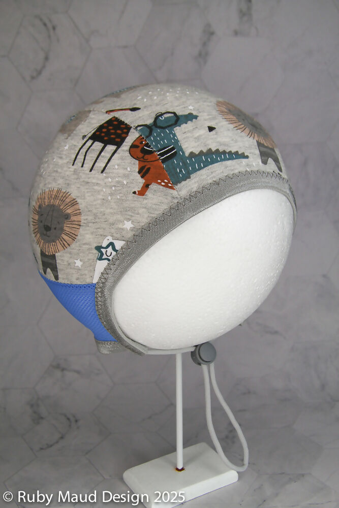 Hearing Aid Bonnet Pilot Cap - Croc & Friends