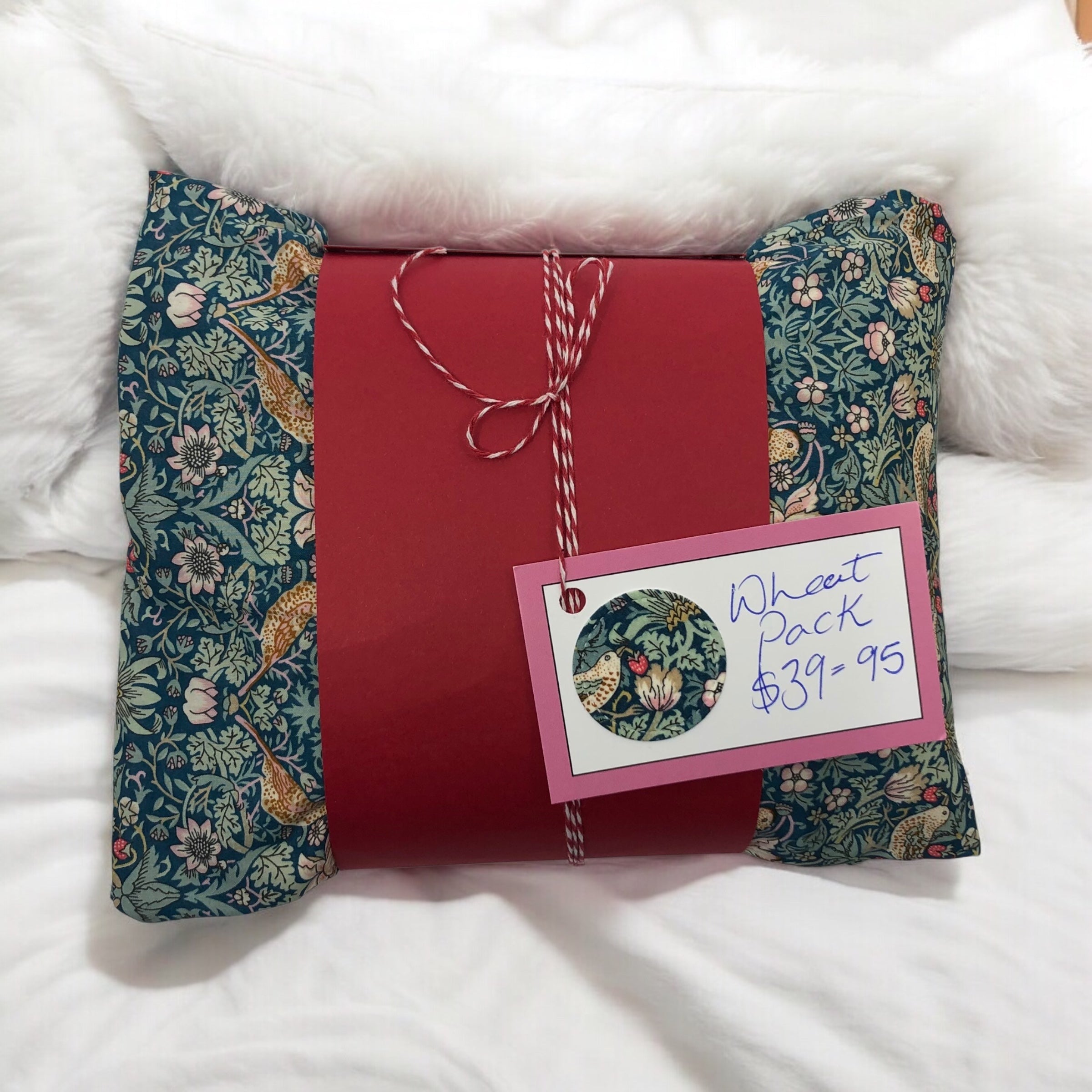 Wheat pack made with Liberty fabric outer layer and wheat in pouch inn